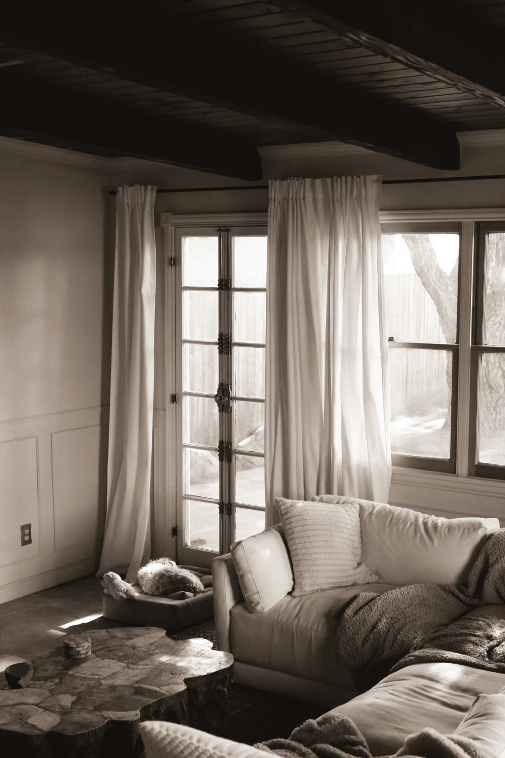 Creating a Wall of Curtains on a Budget - Pretty Little Fawn