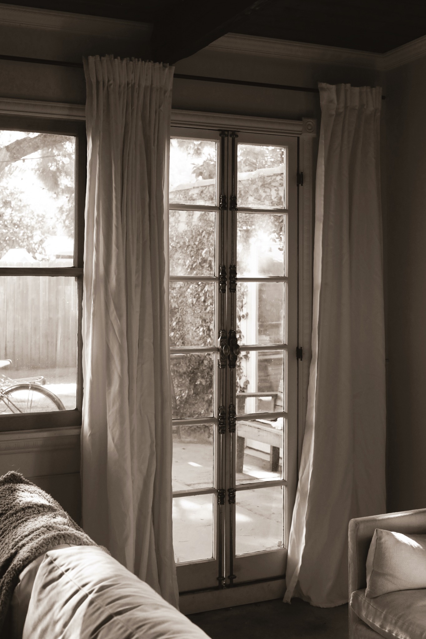 Creating a Wall of Curtains on a Budget - Pretty Little Fawn